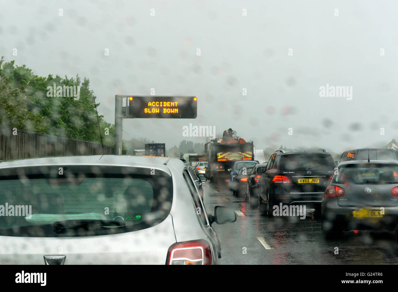 Electronic slow down road sign hi-res stock photography and images - Alamy