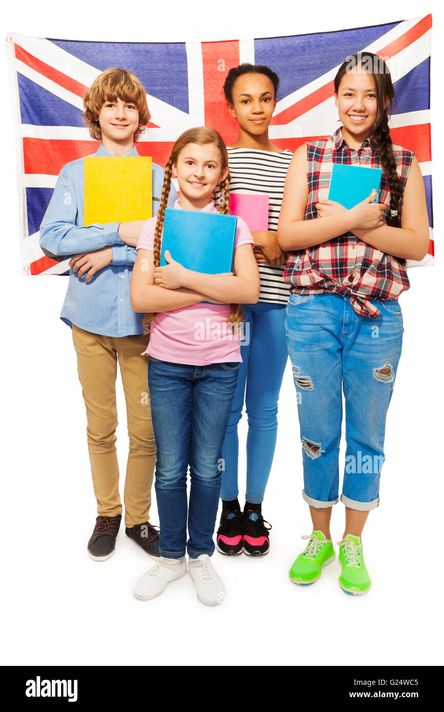 Full-length picture of kids against British flag Stock Photo - Alamy