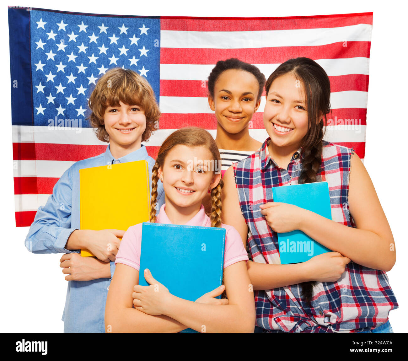 Four happy students standing against American flag Stock Photo - Alamy
