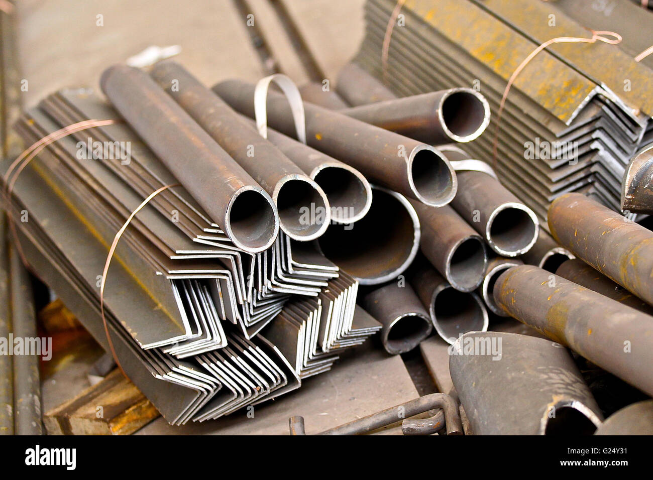 pipes and angles made to create steel structures Stock Photo - Alamy