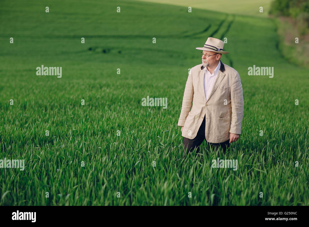 old man in field Stock Photo - Alamy