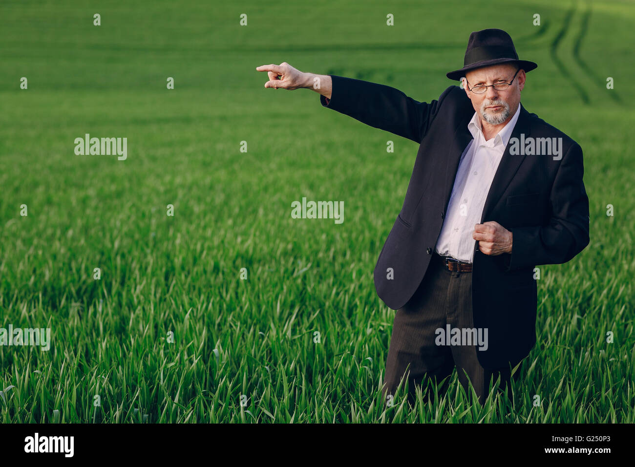 old man in field Stock Photo - Alamy