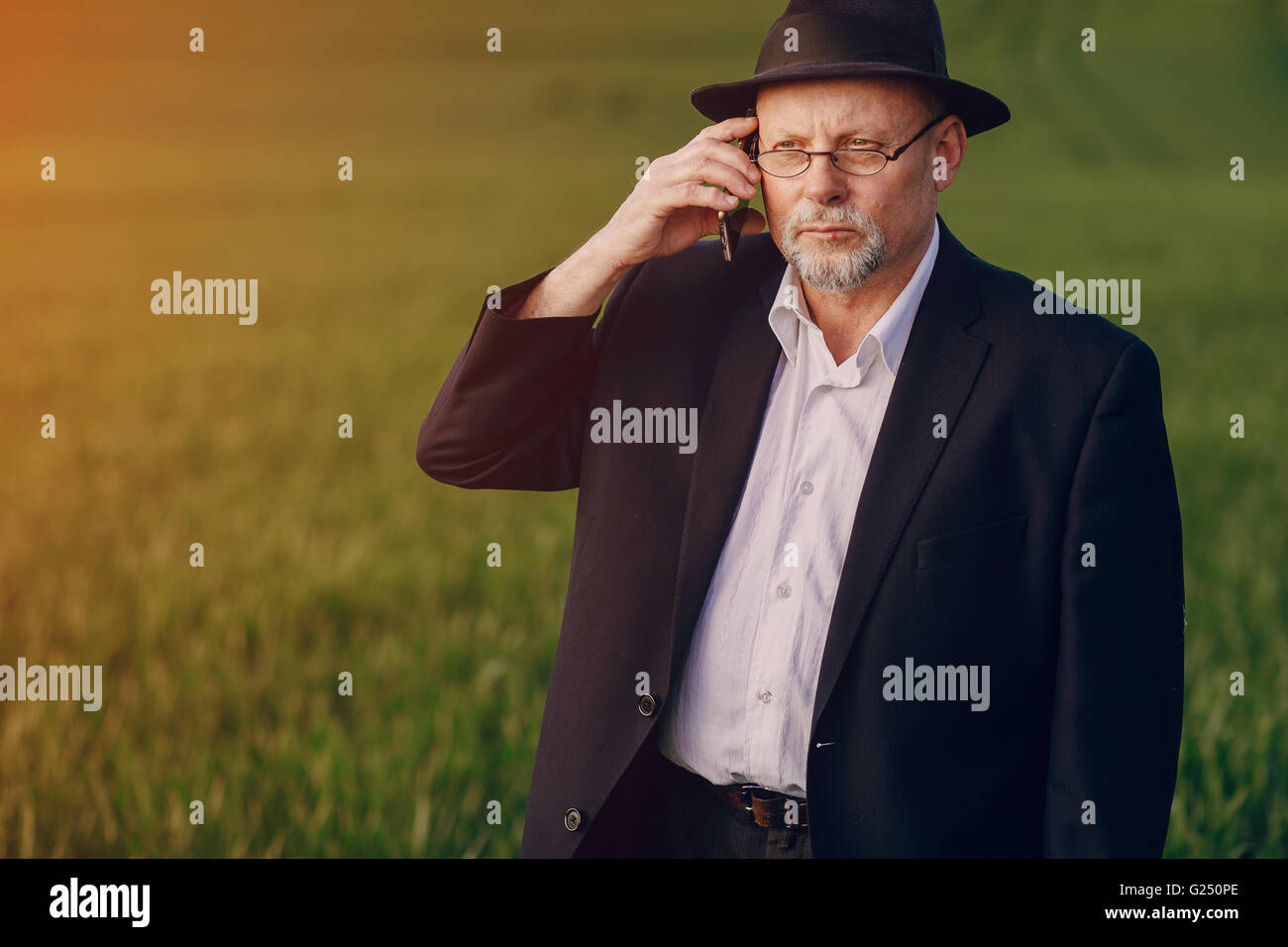 old man in field Stock Photo - Alamy