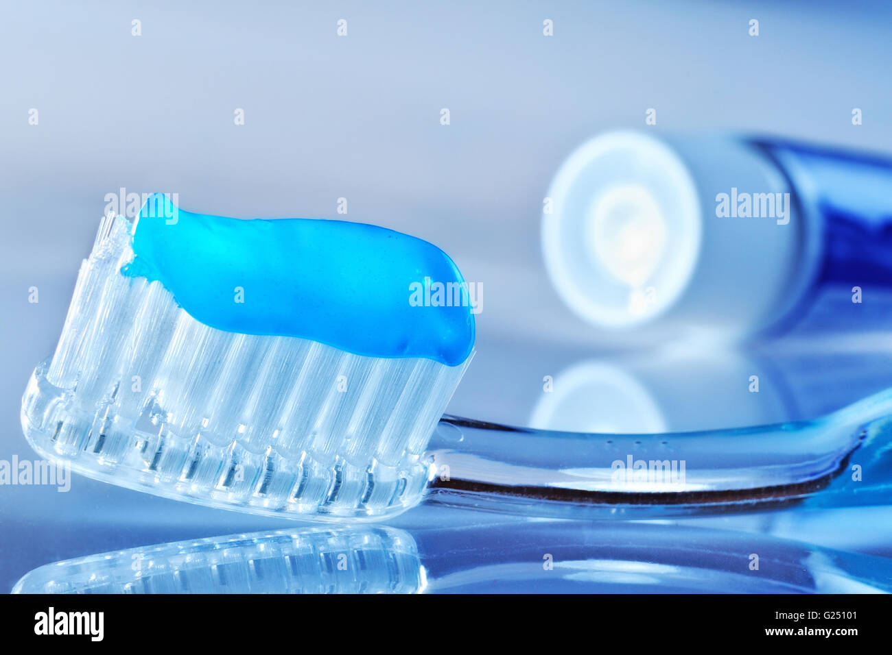toothbrush on the table with toothpaste and toothpaste tube Stock Photo ...
