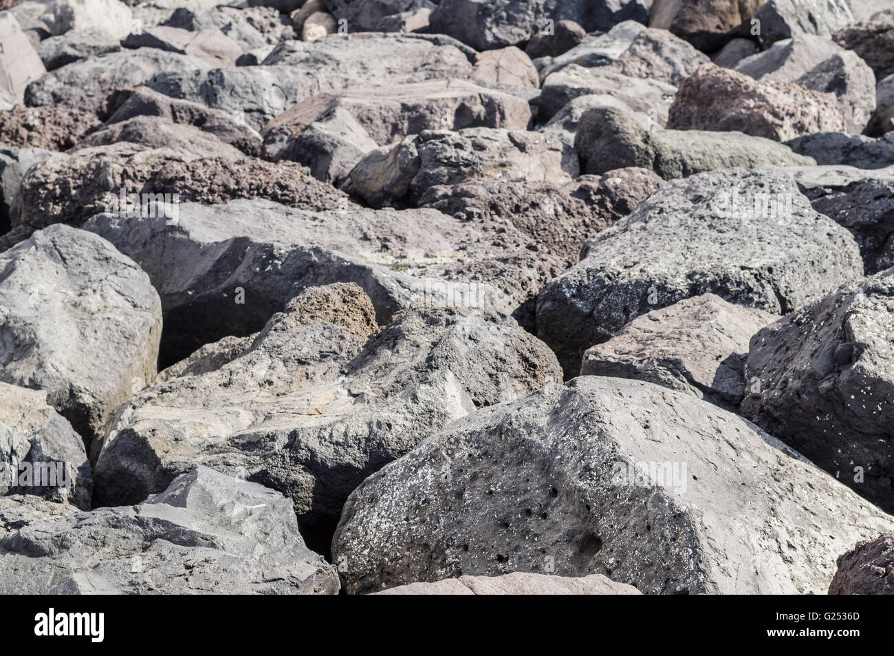 Heap of large stones, rocks abstract background Stock Photo - Alamy