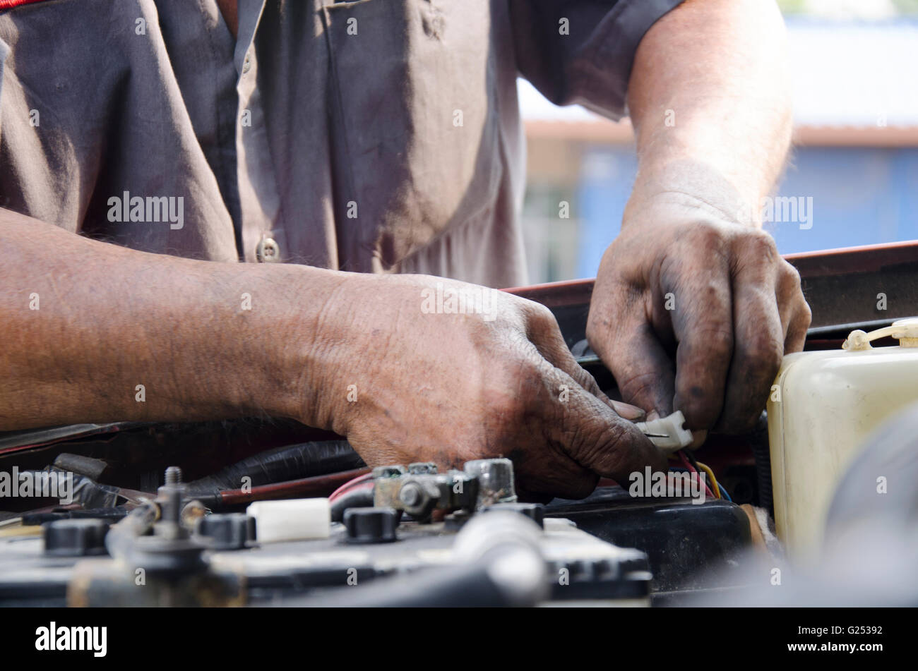 Old man 60 years old professional automotive motor mechanic repair and ...