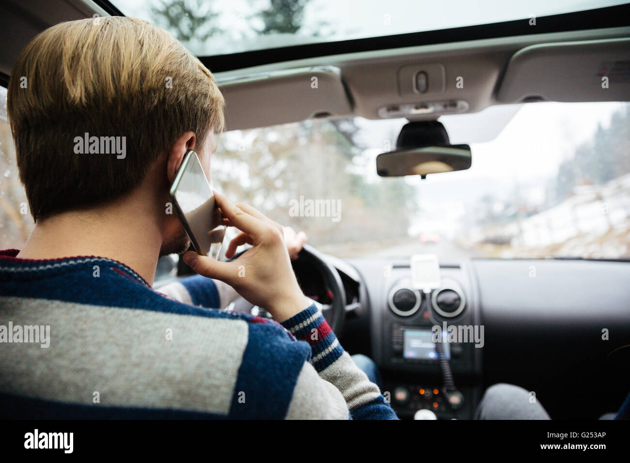 Back view handsome young driver hi-res stock photography and images - Alamy