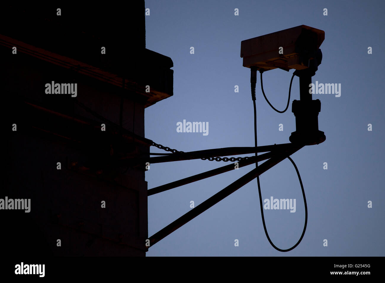 CCTV security camera silhouette Stock Photo - Alamy
