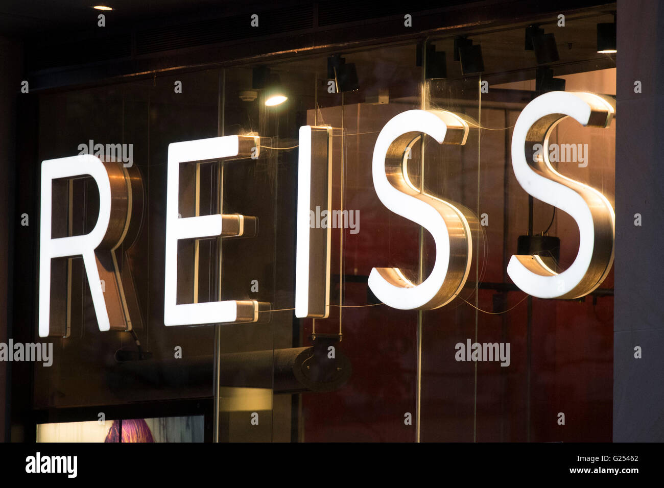 Reiss clothes store sign logo Stock Photo - Alamy