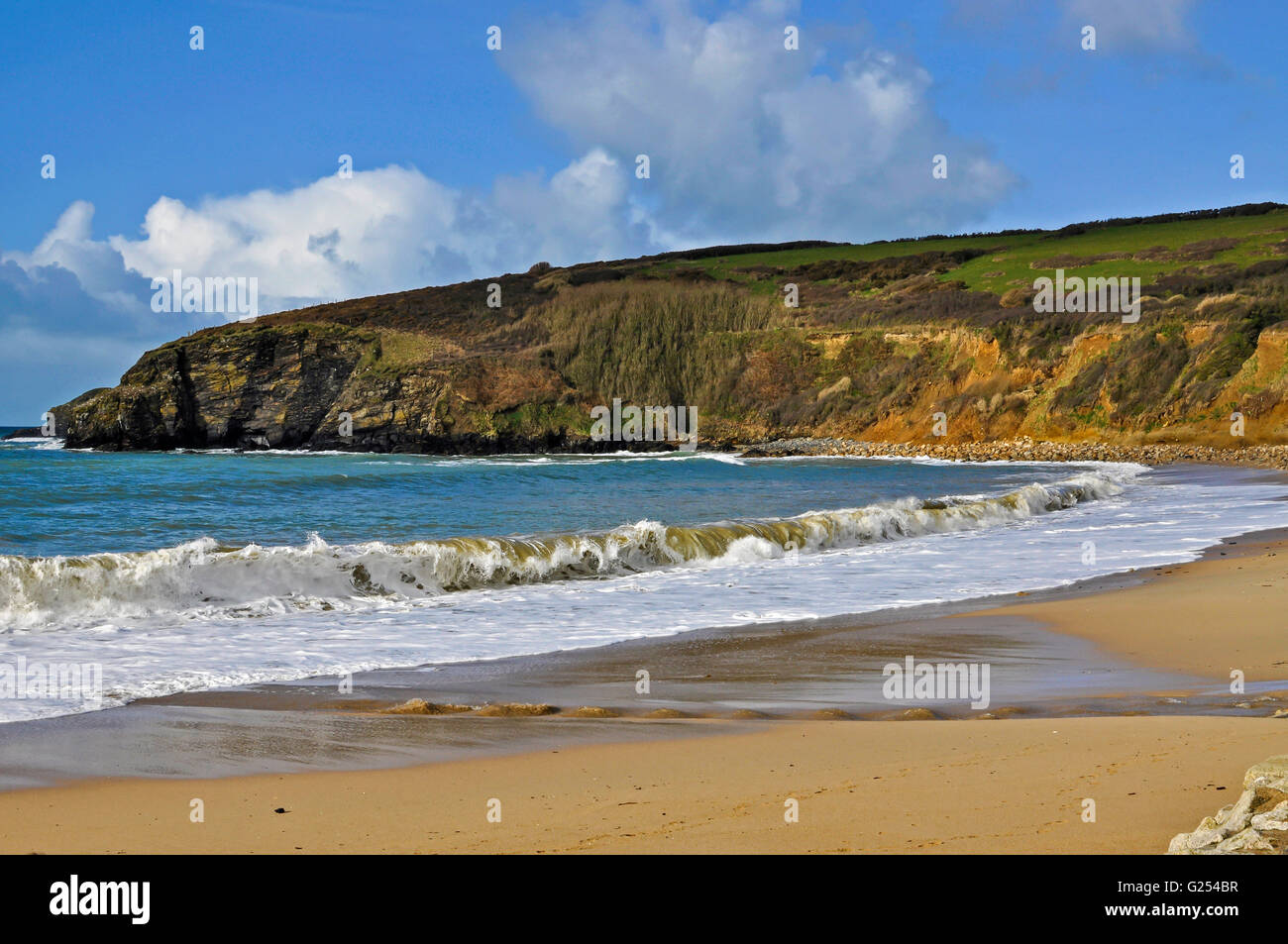 Early morning spring sun on a lonely Praa Sands beach, Cornwall, UK ...