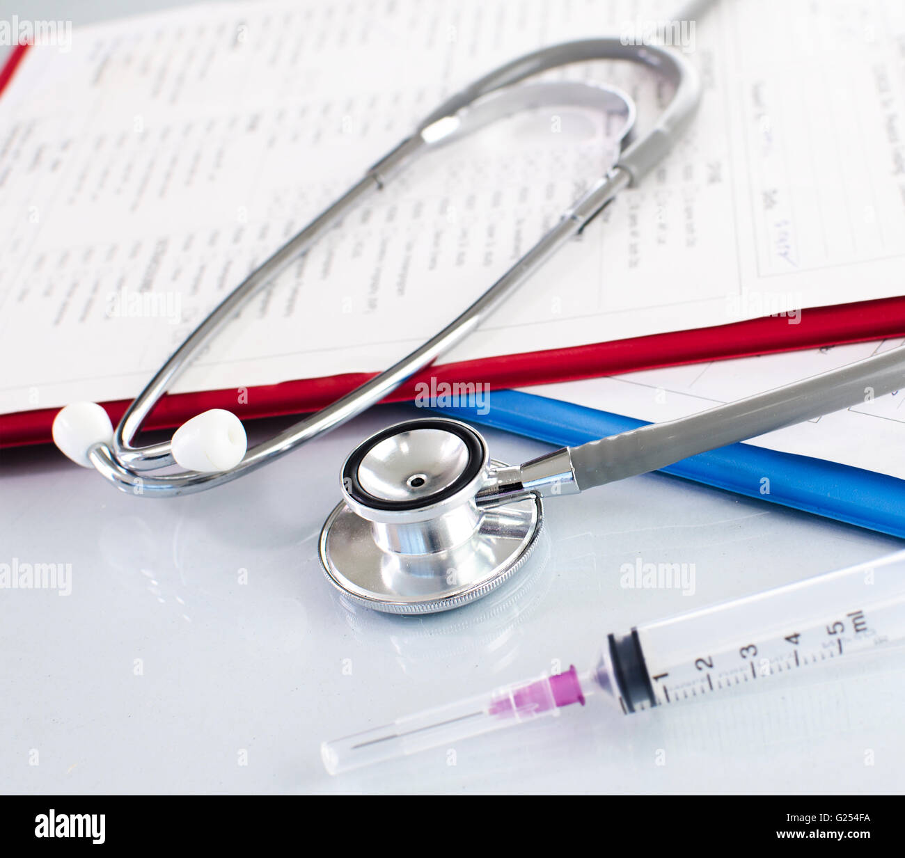 Medical history on clipboard with stethoscope on light background Stock ...