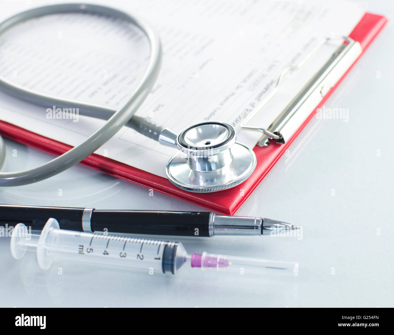 Medical history on clipboard with stethoscope on light background Stock ...