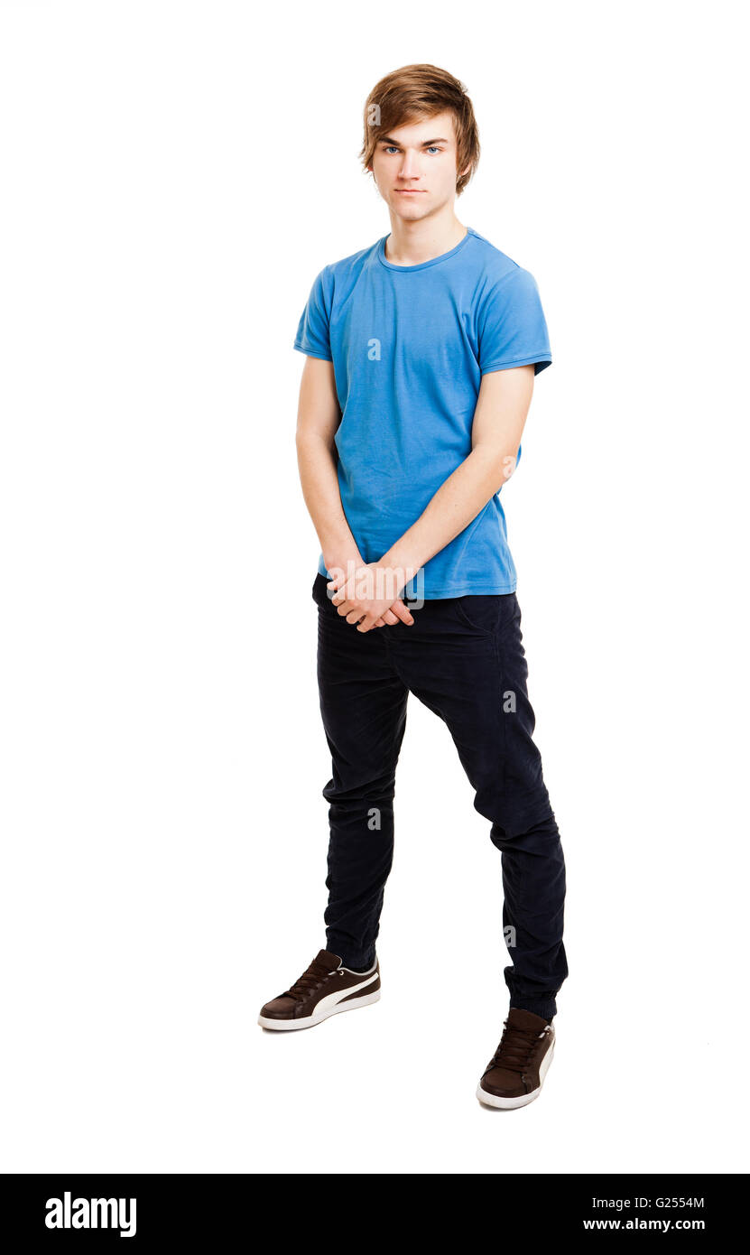Portrait of a handsome young man standing over a white background Stock ...