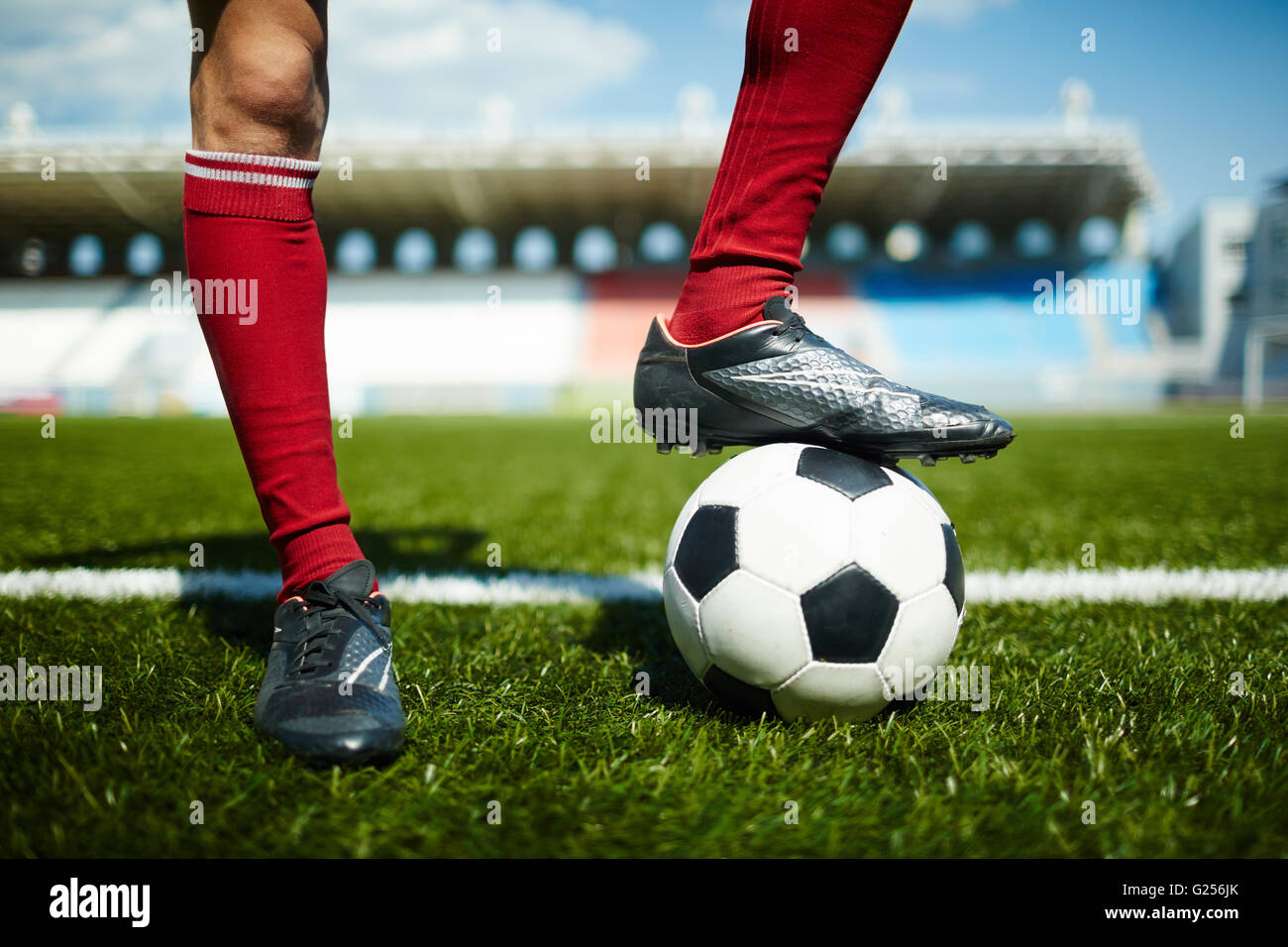 Footballer red boots hi-res stock photography and images - Alamy