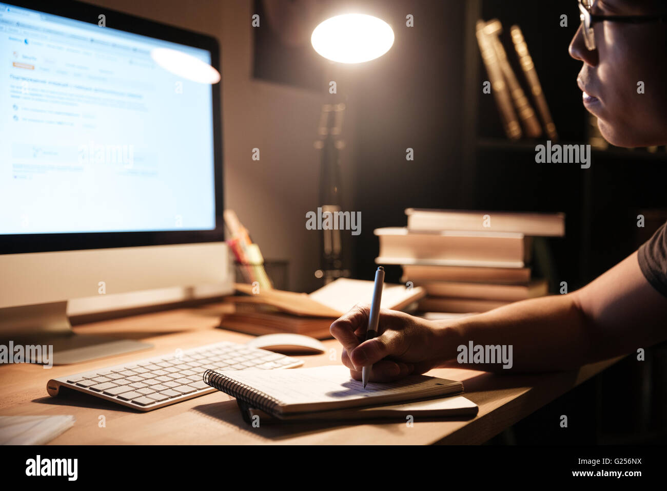 Closeup young man studying home hi-res stock photography and images - Alamy