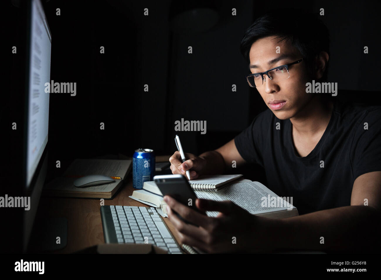 Handsome man nighttime with phone hi-res stock photography and images ...