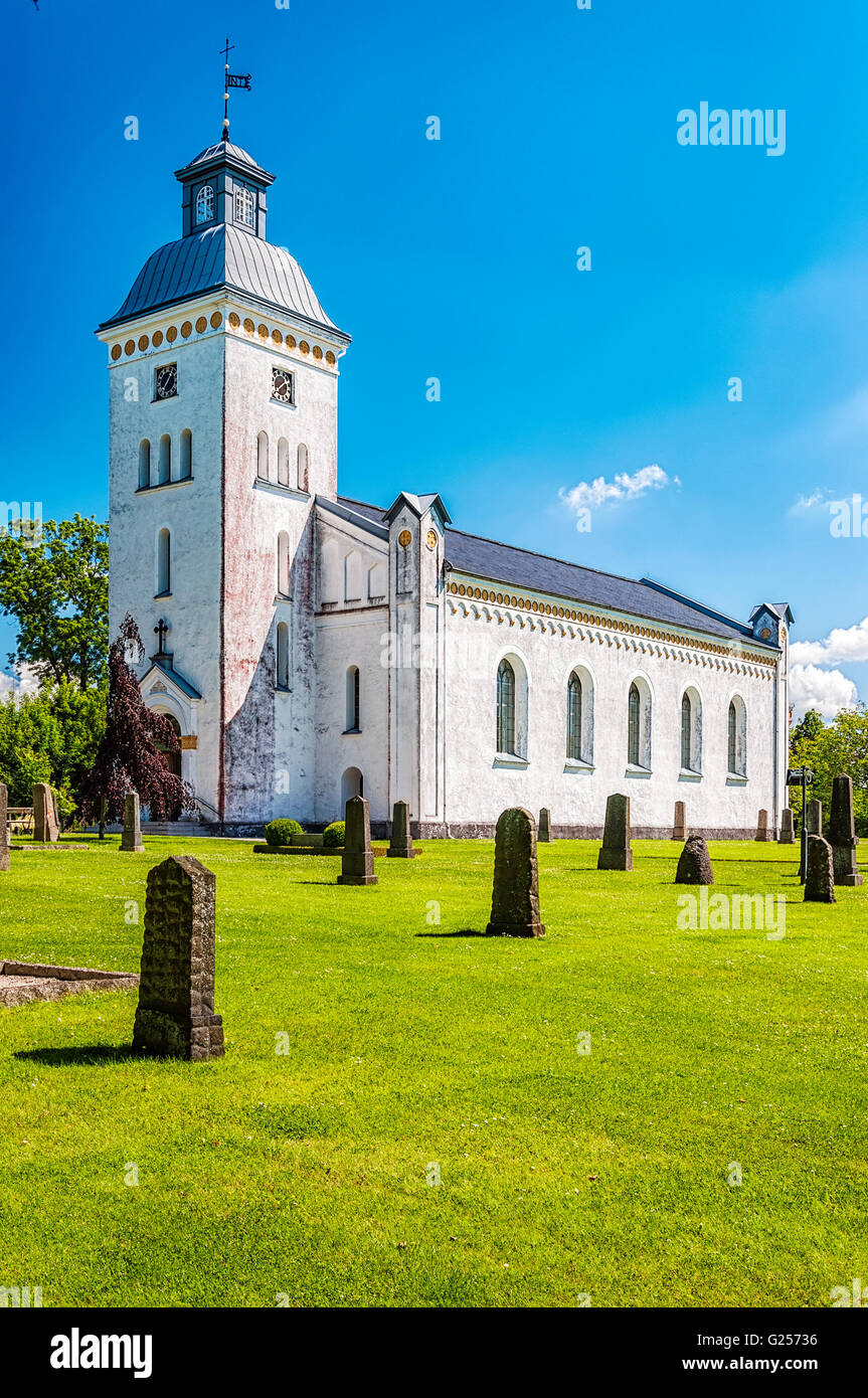 A typical swedish small white church located near the grounds of ...