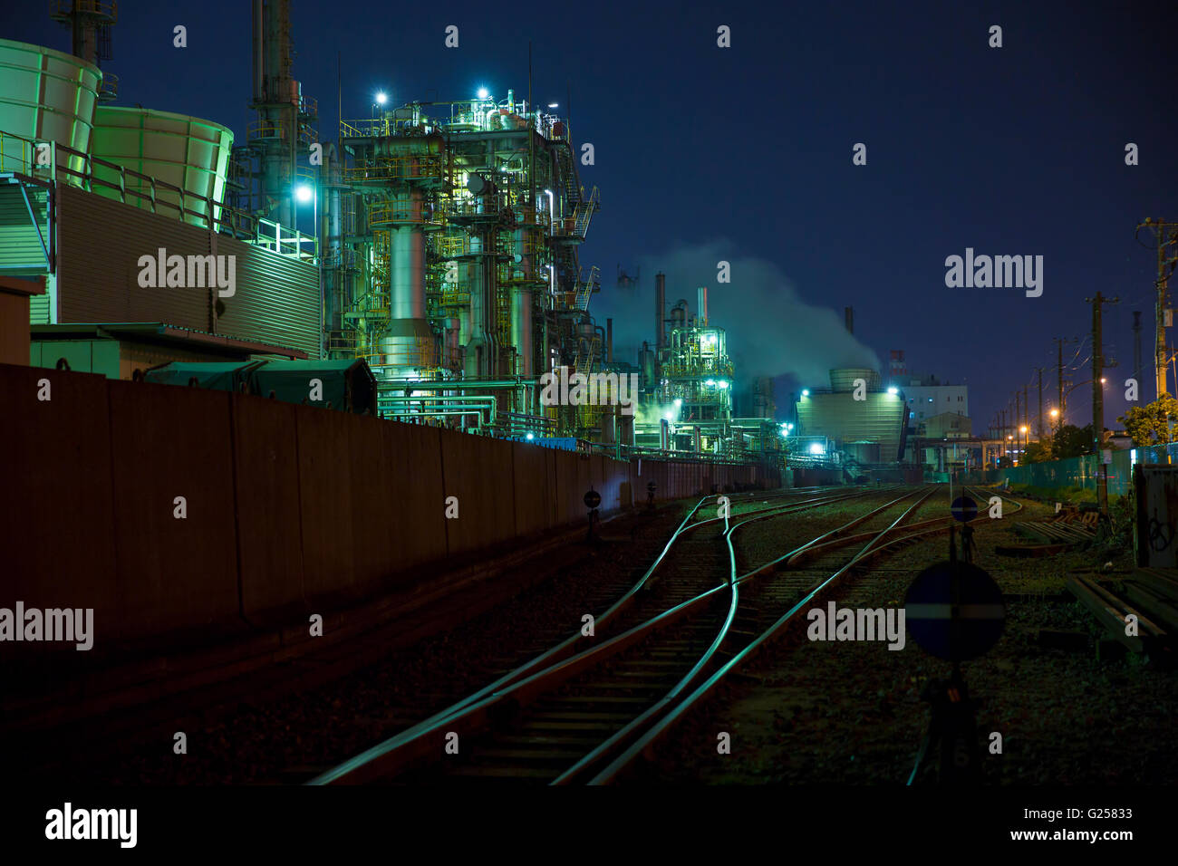 Manufacturing plant at night Stock Photo - Alamy