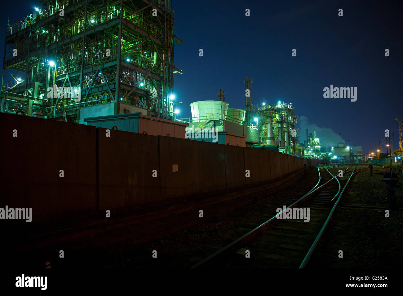 Manufacturing plant at night Stock Photo - Alamy