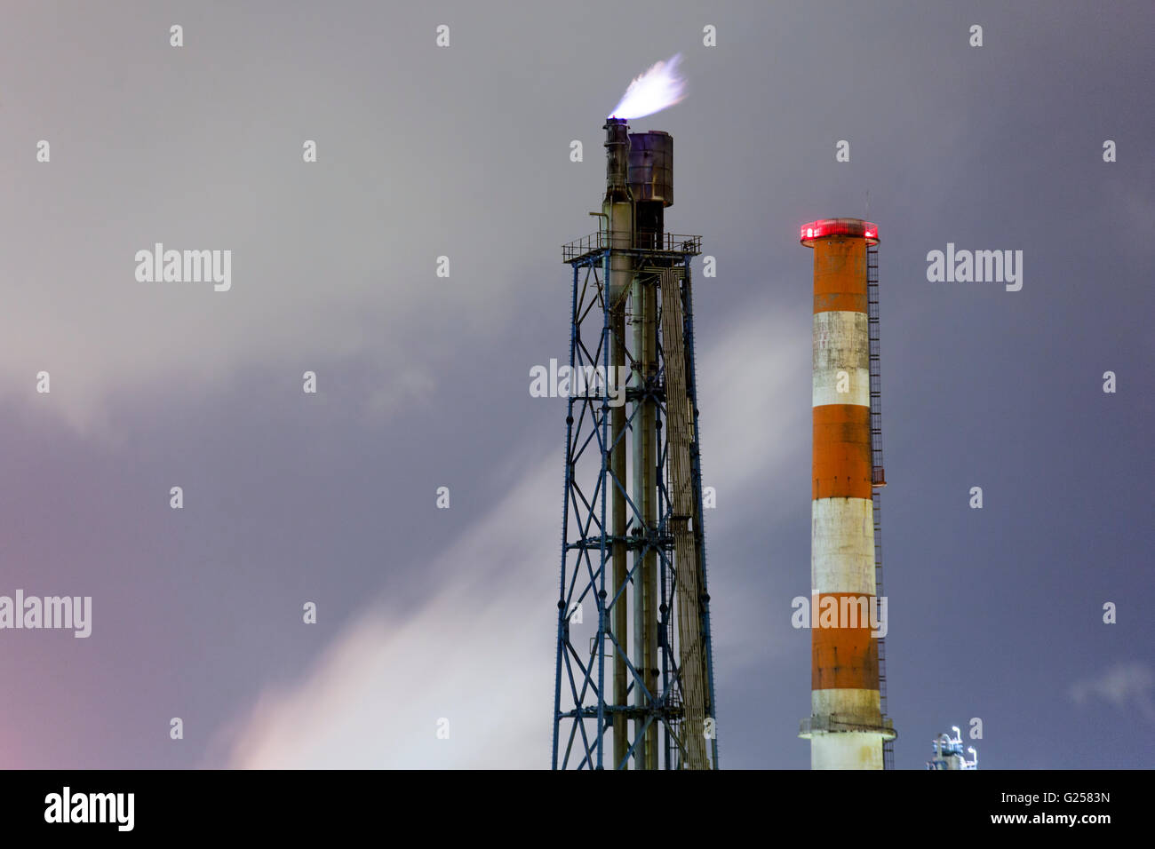Manufacturing plant at night Stock Photo - Alamy