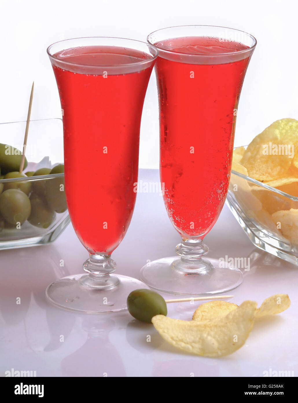 Italian aperitif on white background with snacks Stock Photo - Alamy