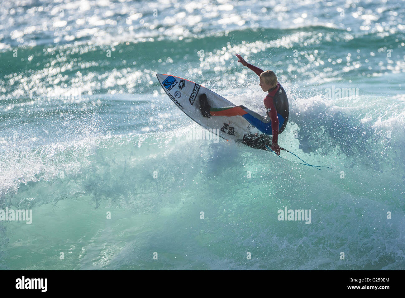 A surfer in spectacular action at Fistral in Newquay, Cornwall, England ...