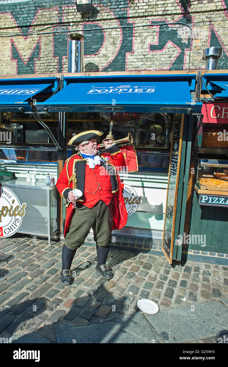 Town crier blowing bugle trumpet hi-res stock photography and images ...