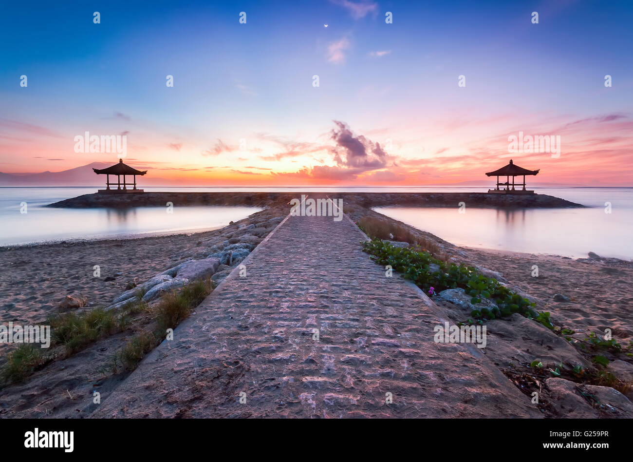 Walkway and pagodas on the beach, Bali, Indonesia Stock Photo - Alamy