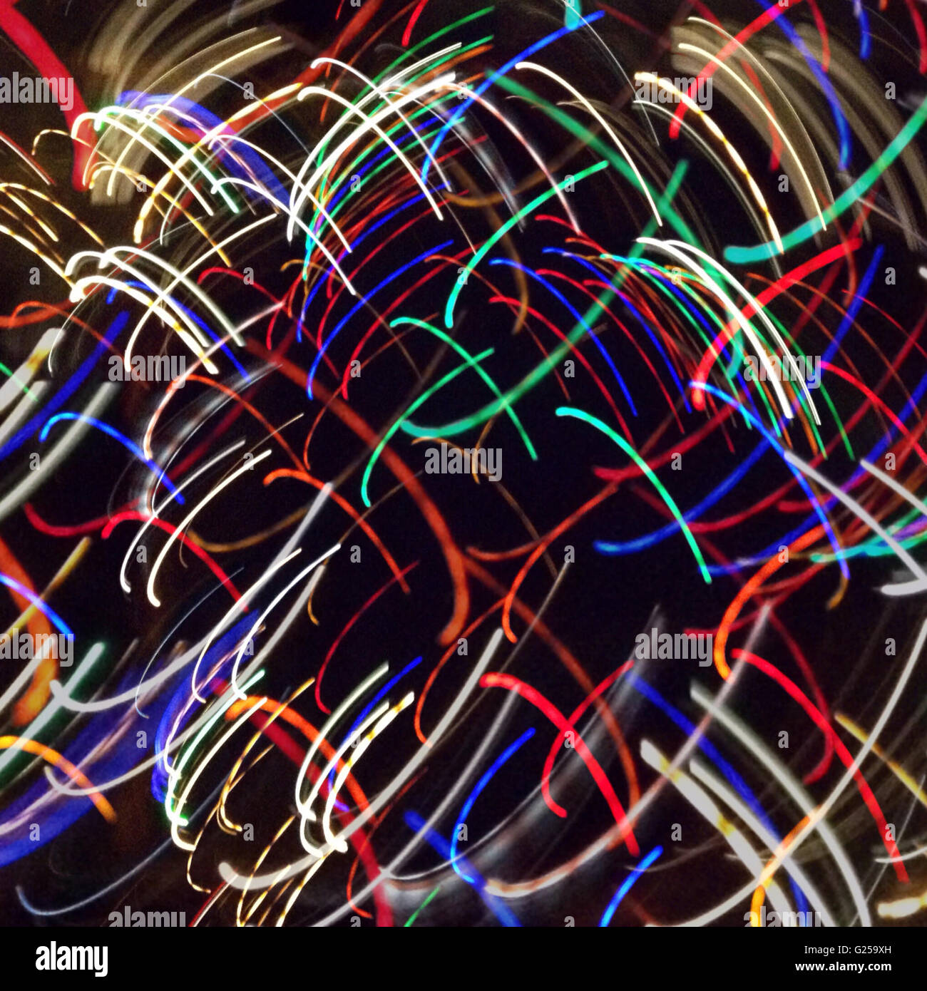 Multi-colored lights on black background Stock Photo - Alamy