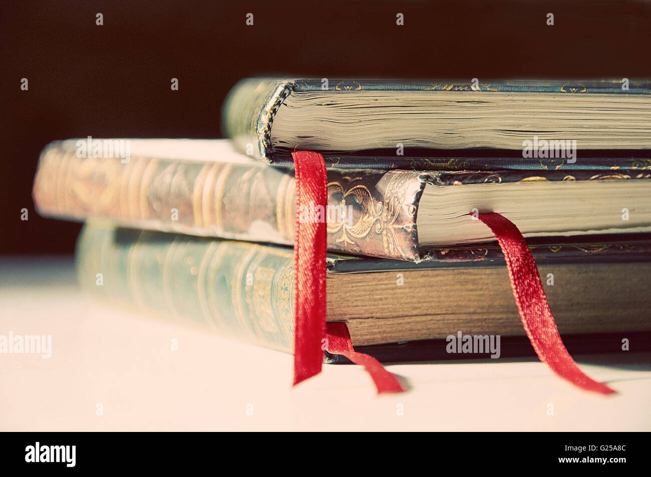 Stack of three books hi-res stock photography and images - Alamy