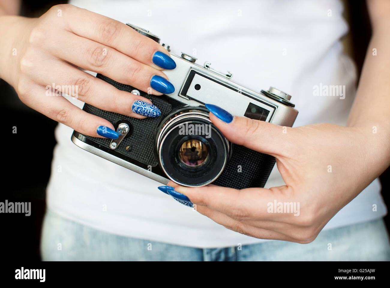 Person holding camera hi-res stock photography and images - Alamy