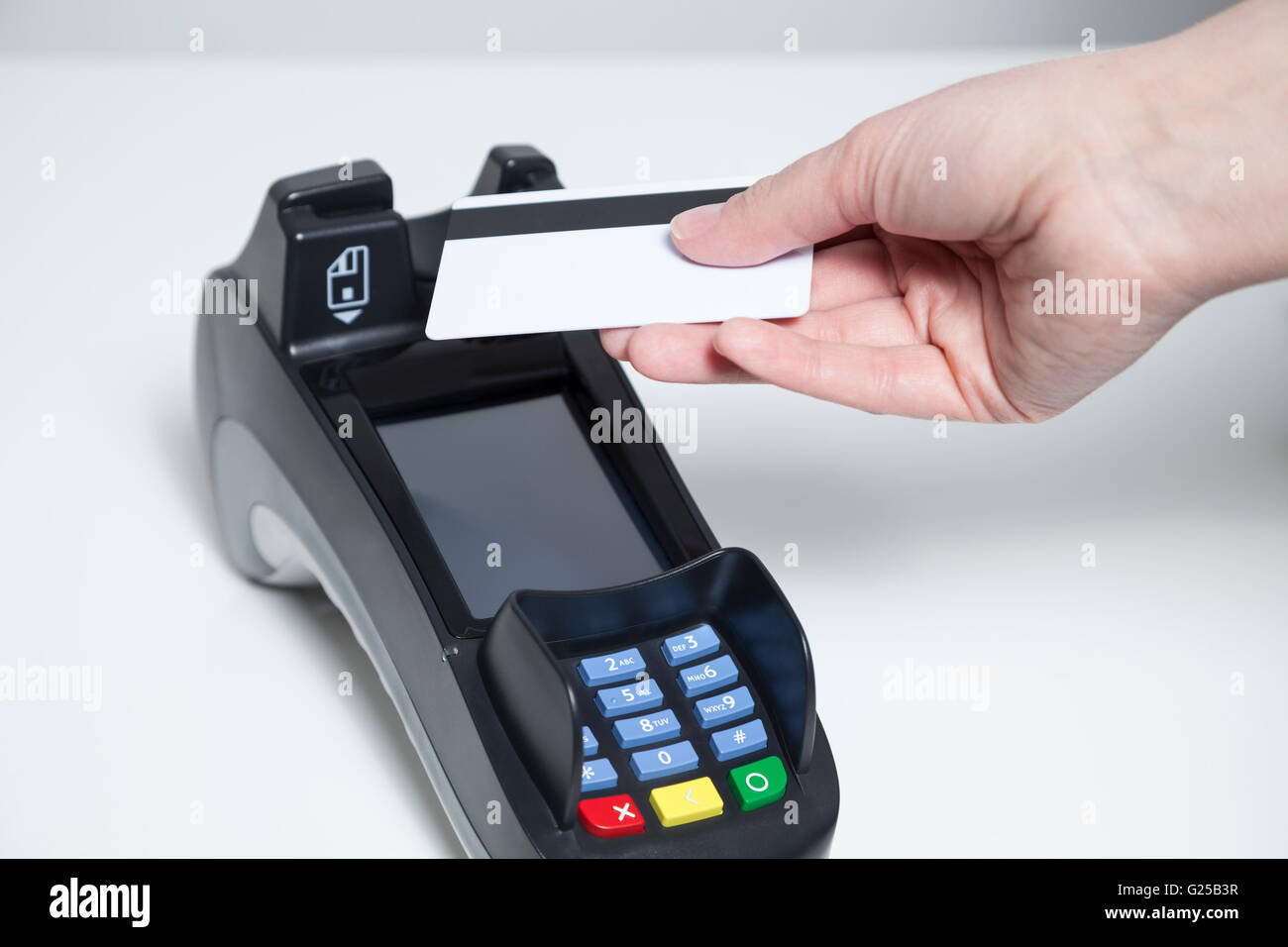 Contactless with a card an card reader Stock Photo - Alamy
