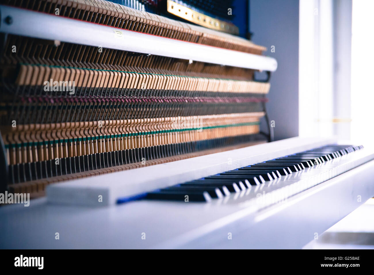 open piano mechanism with hammers and strings Stock Photo - Alamy