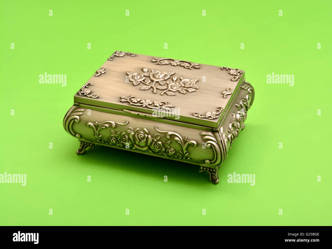 Old fashioned treasure box isolated on green background Stock Photo - Alamy Old fashioned treasure box isolated on green background Stock Photo - Alamy