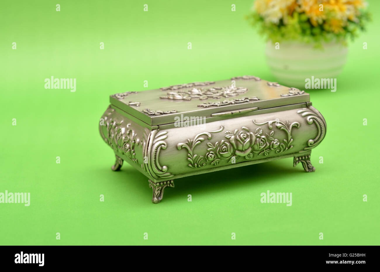 Old fashioned treasure box isolated on green background Stock Photo - Alamy Old fashioned treasure box isolated on green background Stock Photo - Alamy