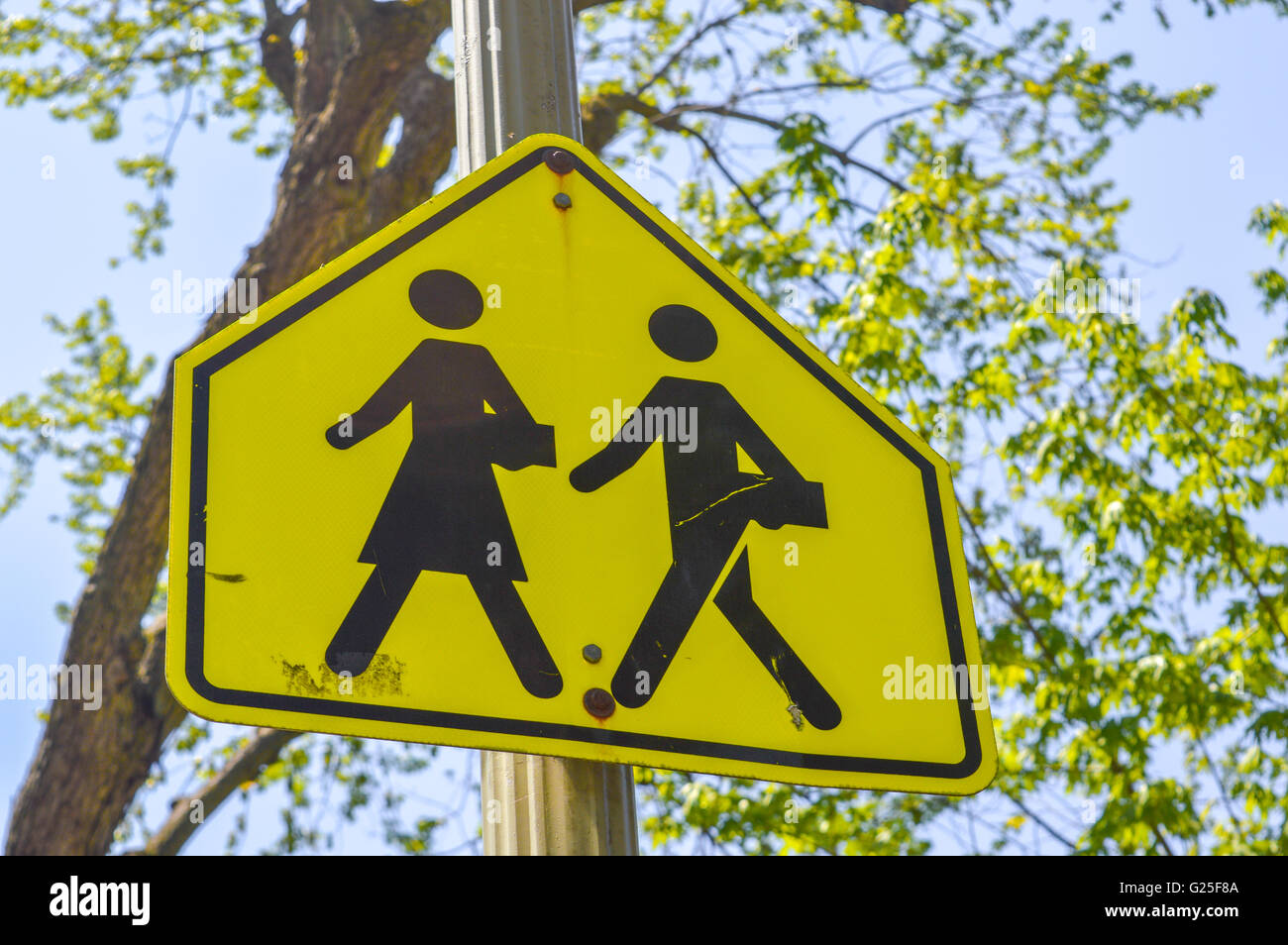 School warning sign in Montreal downtown Stock Photo - Alamy
