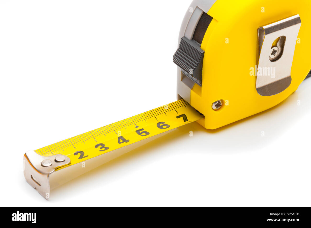 Measuring and calculating instruments - yellow ruler Stock Photo - Alamy