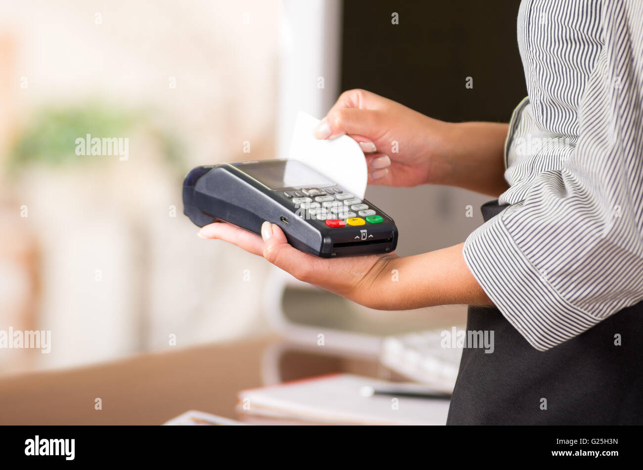 Credit card machine for fast payments, woman hands holding and swiping ...