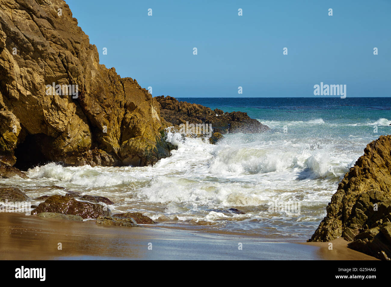 Waves beating against coastal rocks on the cliffs Stock Photo - Alamy