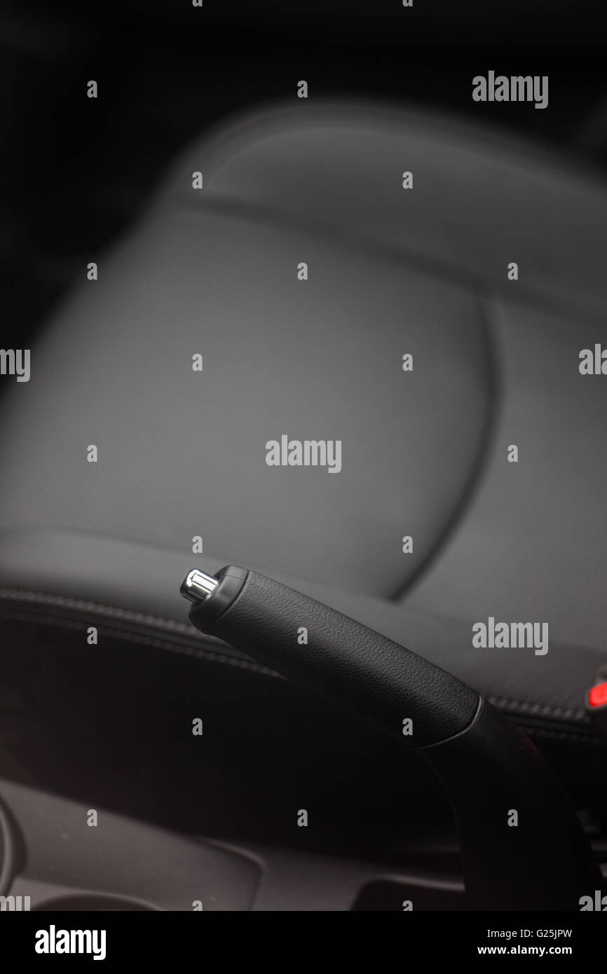 Close up shot of the hand brake of a car Stock Photo - Alamy