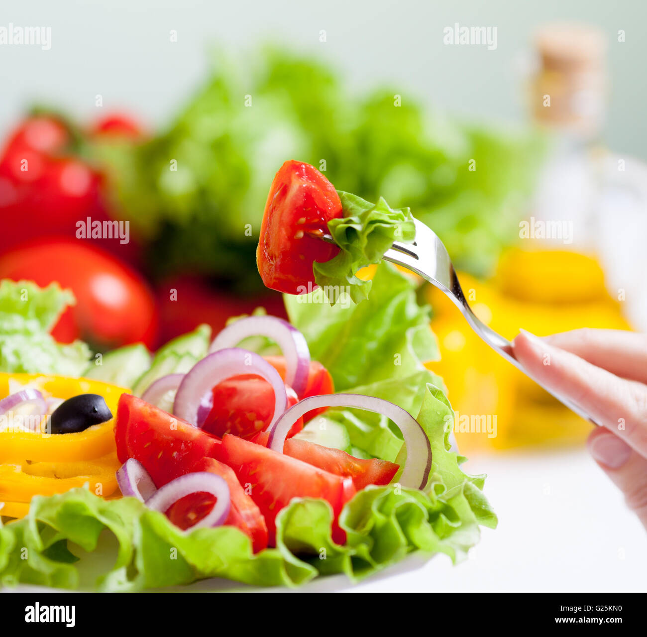 Healthy food fresh salad eating Stock Photo - Alamy