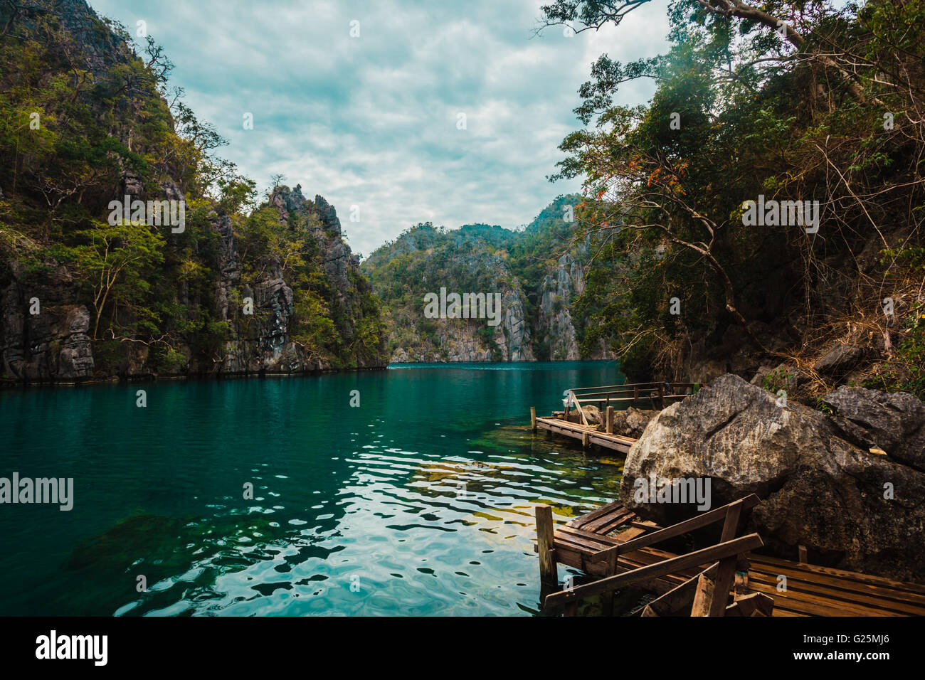 A pier in Asia's cleanest lake, lake Kayangan in the Philippines Stock ...