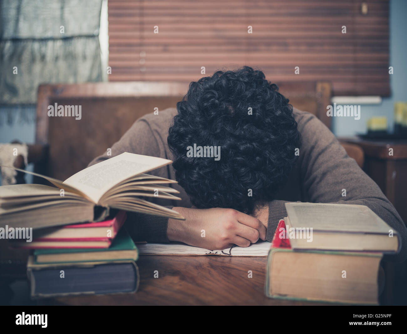 Student sleeping study table hi-res stock photography and images - Alamy