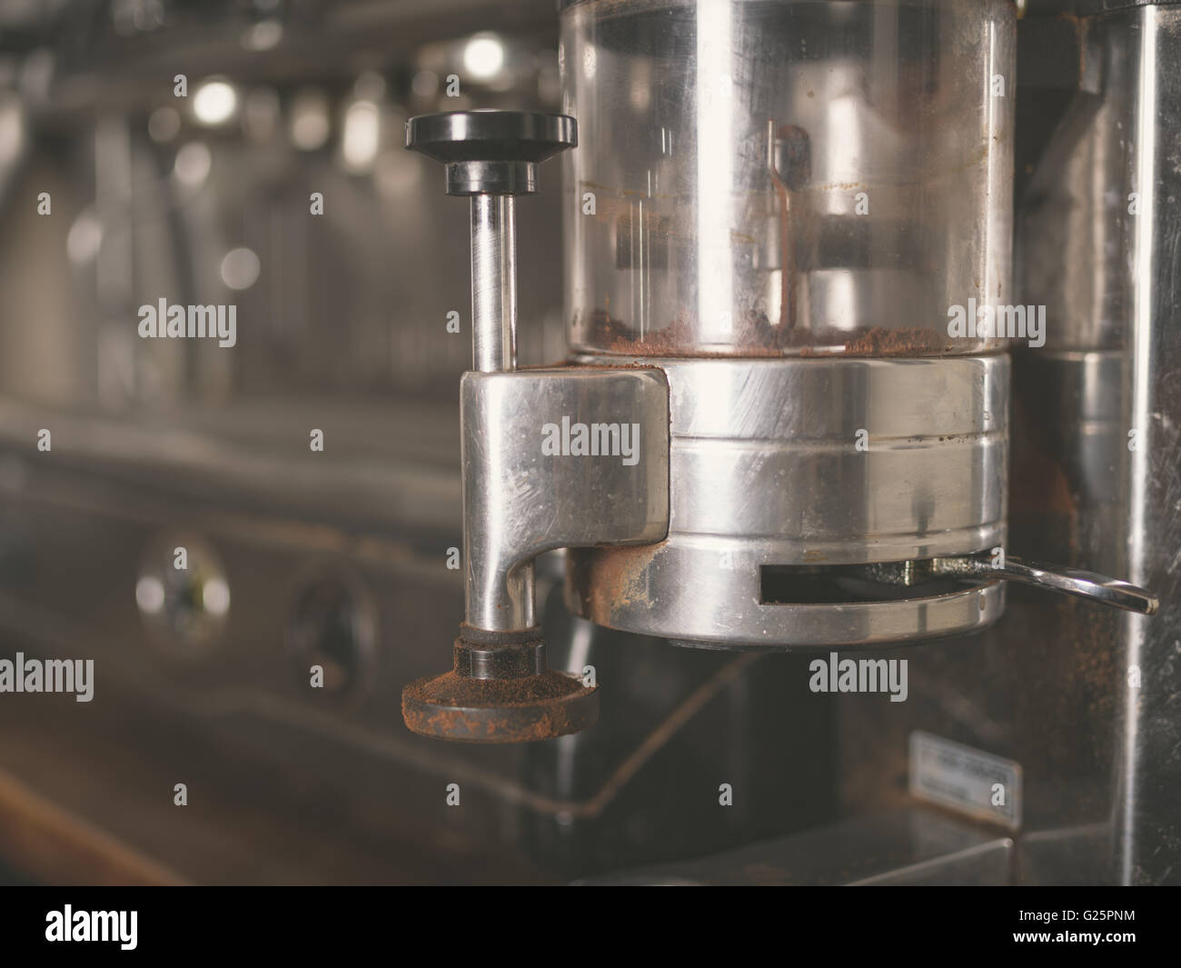 Detail of a professional coffee machine with ground coffee on it Stock ...