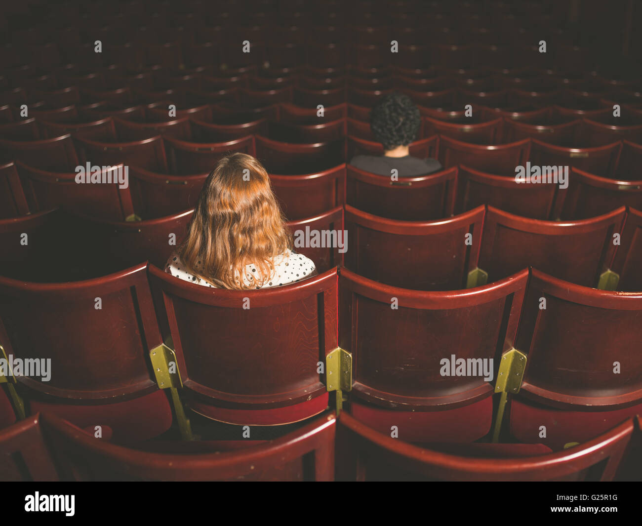 Rear view people sitting in a cinema hi-res stock photography and ...