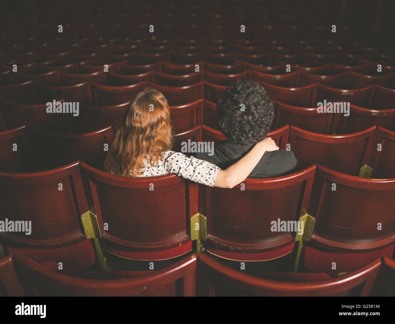 Rear view people sitting in a cinema hi-res stock photography and ...
