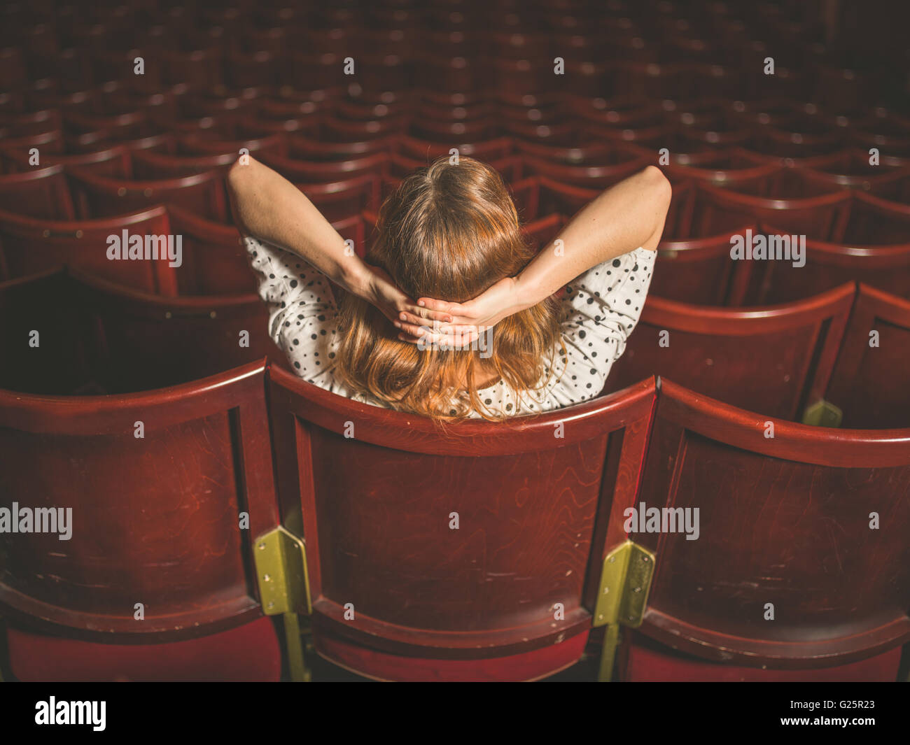 Rear view people sitting in a cinema hi-res stock photography and ...