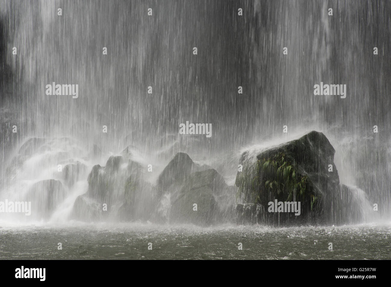 Waterfall was pounding the rocks hi-res stock photography and images ...