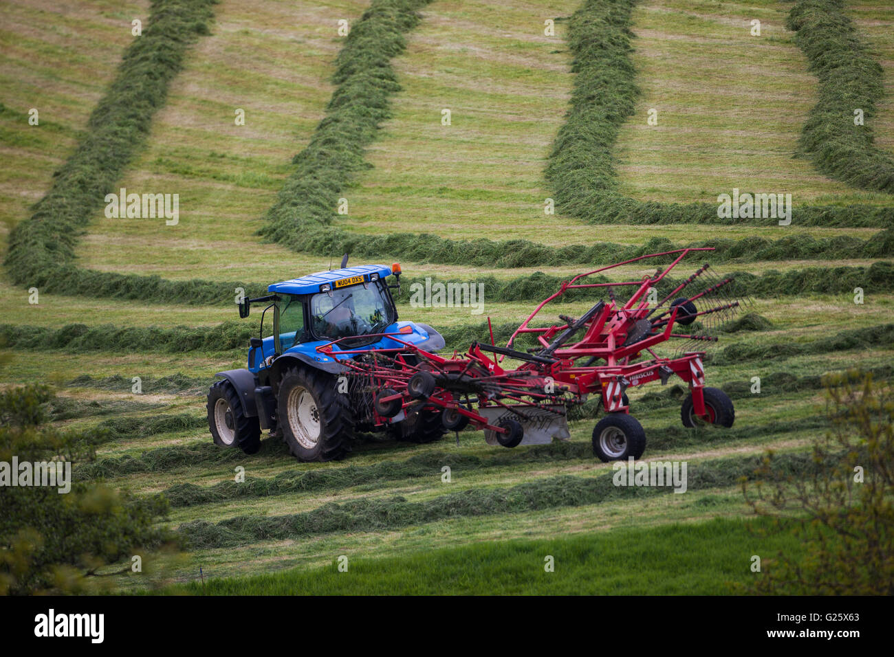 Tractor and Rake Stock Photo - Alamy