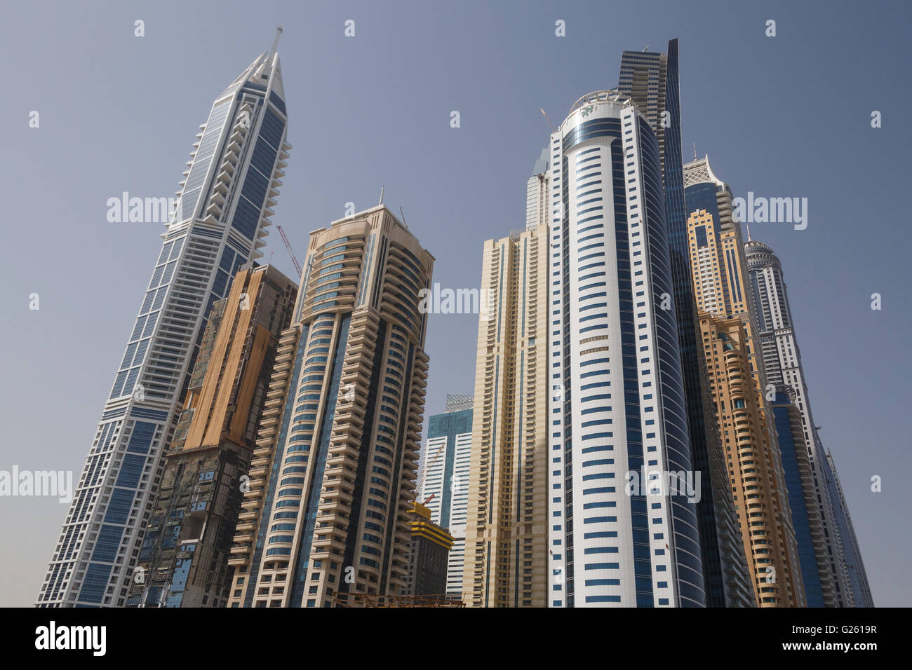 skyscrapers of Dubai over blue sky Stock Photo - Alamy